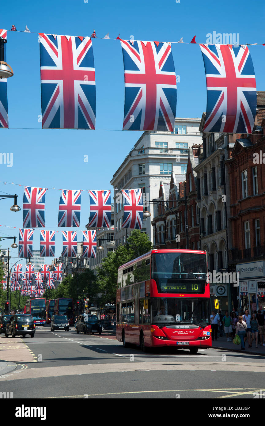 London buses amongst Union Jack flags ready for the Queen's Jubilee ...
