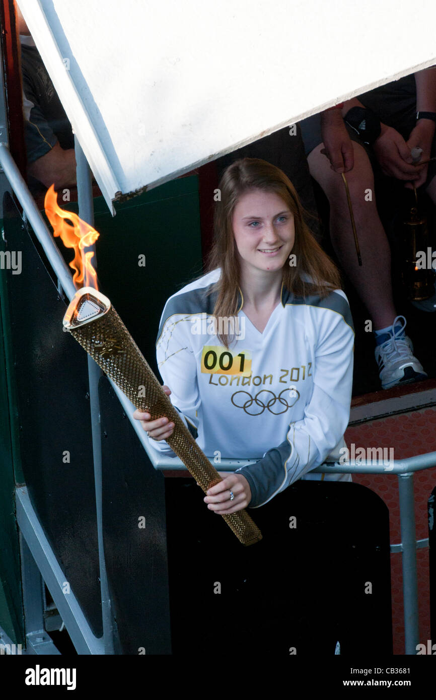 Day 10 of the Olympic torch relay through the United Kingdom; a local ...