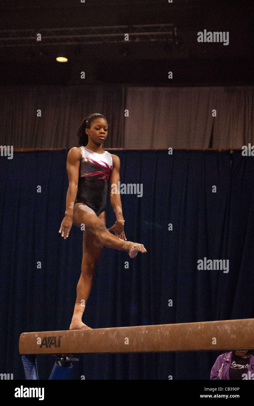 Gabrielle Douglas is all-muscle on the balance beam practice at the UIC ...