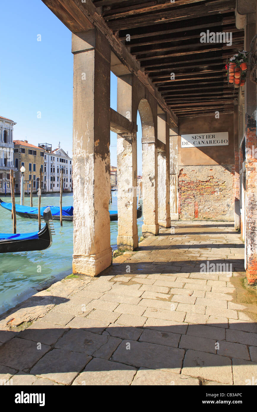 Vertical oriented image of old passage on Grand Canal in Venice, Italy ...