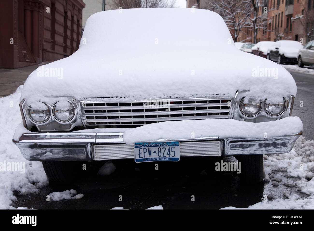 A Chevrolet covered in a fresh dusting of snow in New York, America ...