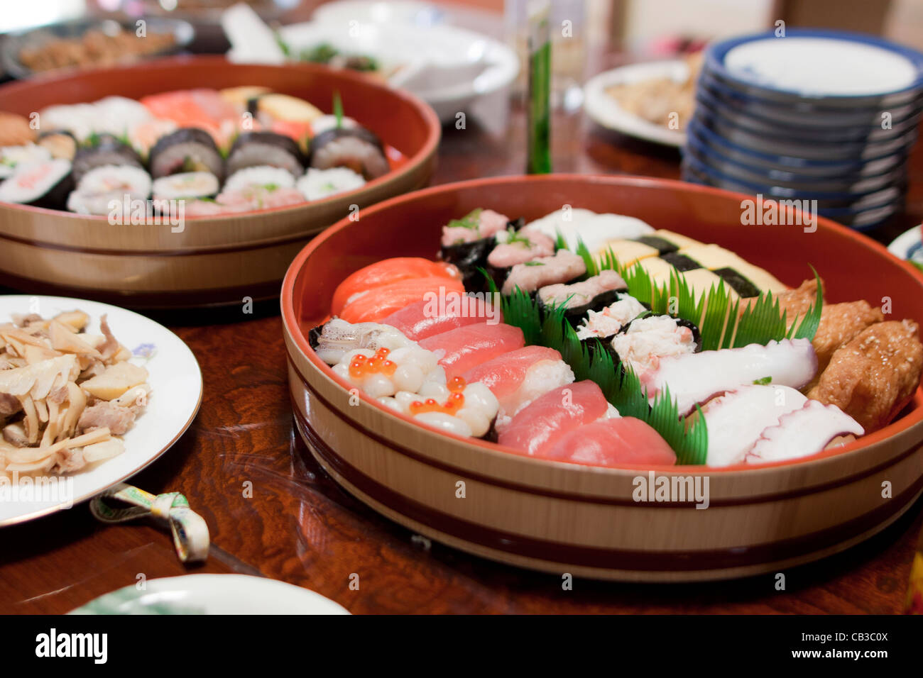 A traditional Japanaese dinner of sushi and sashimi Stock Photo - Alamy