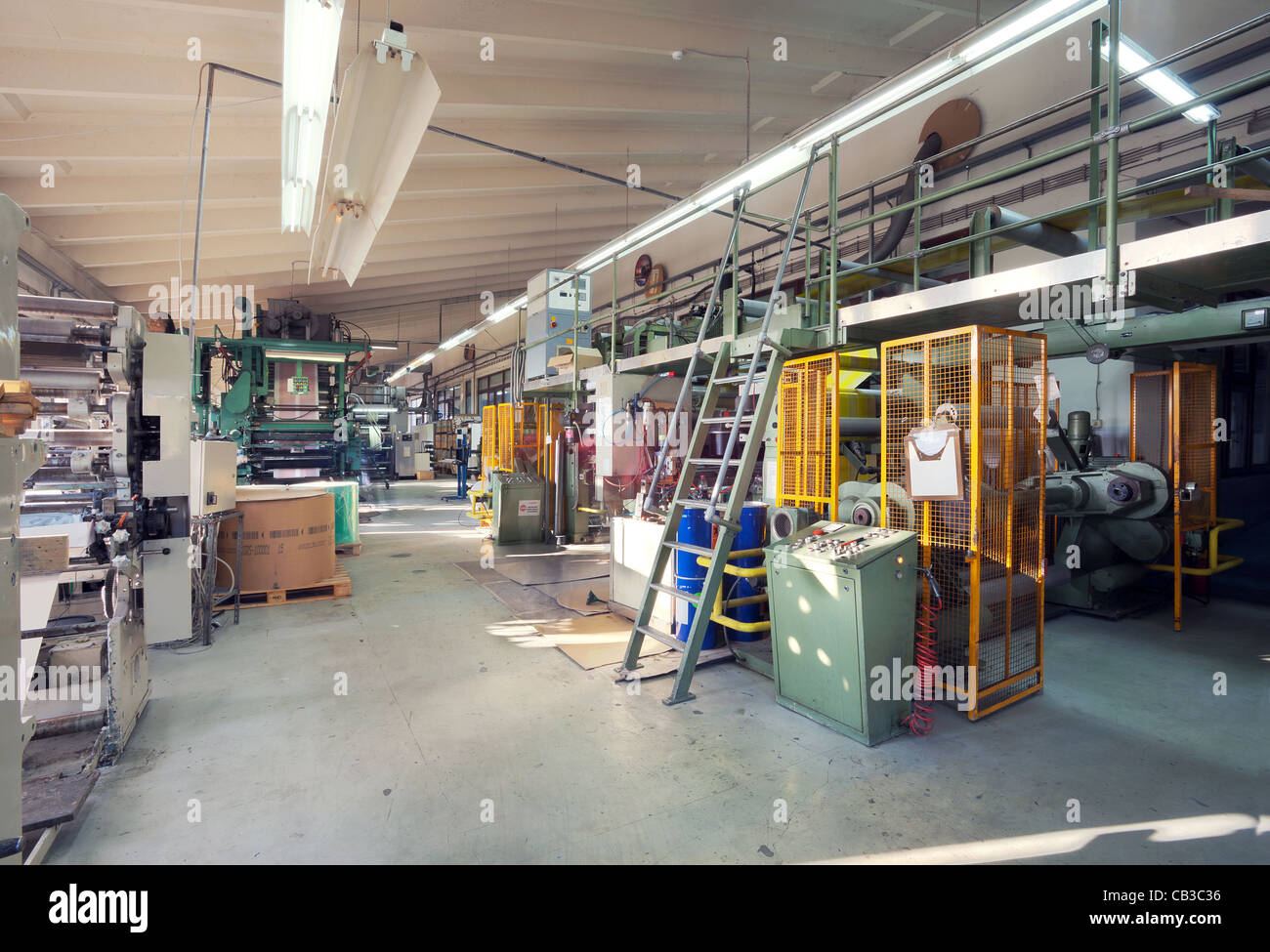 Details of a printing machine inside factory Stock Photo - Alamy