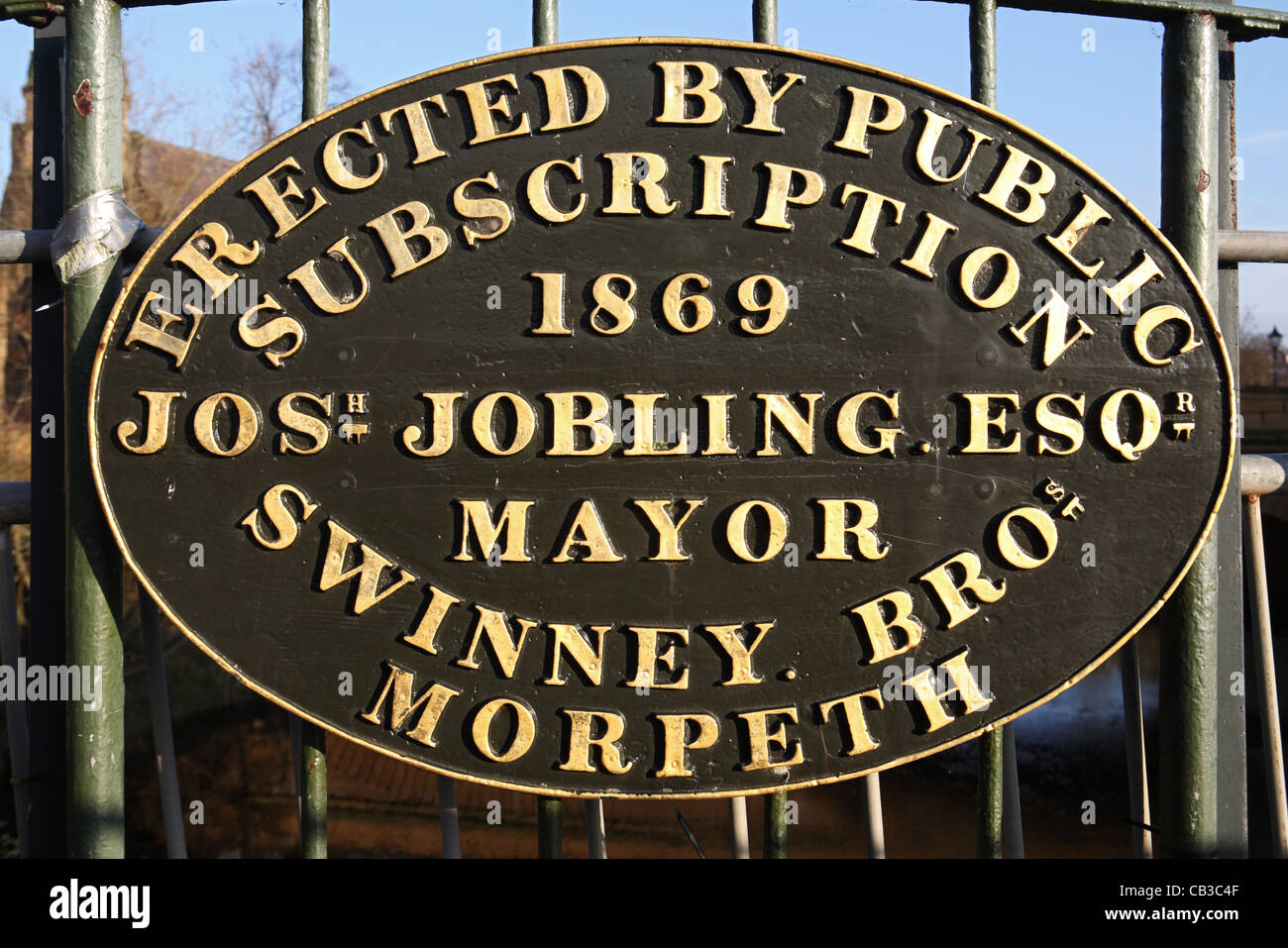 Victorian brass plaque on Chantry footbridge over the river Wansbeck in ...