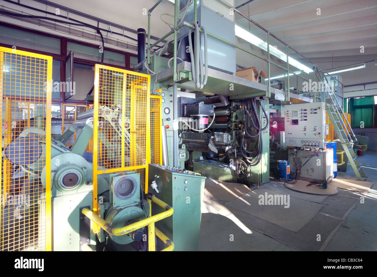 Details of a printing machine inside factory Stock Photo - Alamy