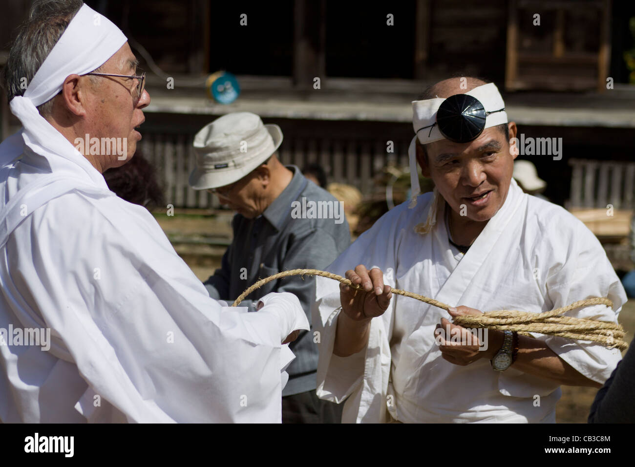 Two Japanese men in traditional clothes at a festival in Seiwa, Japan ...