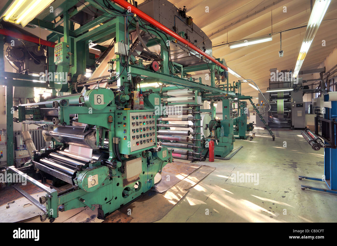Details of a printing machine inside factory Stock Photo - Alamy