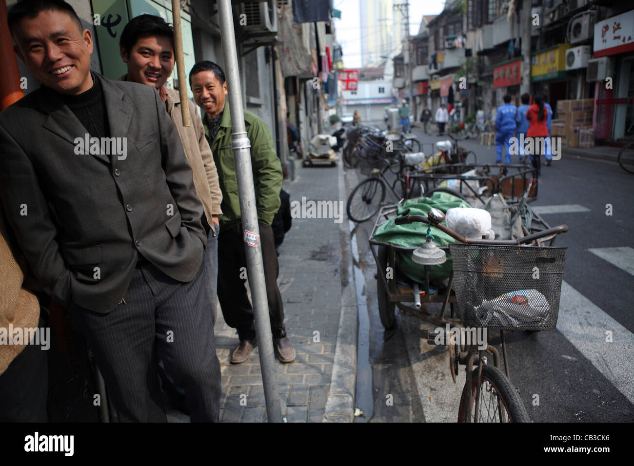 migrant peasant workers make living by collecting & selling materials ...