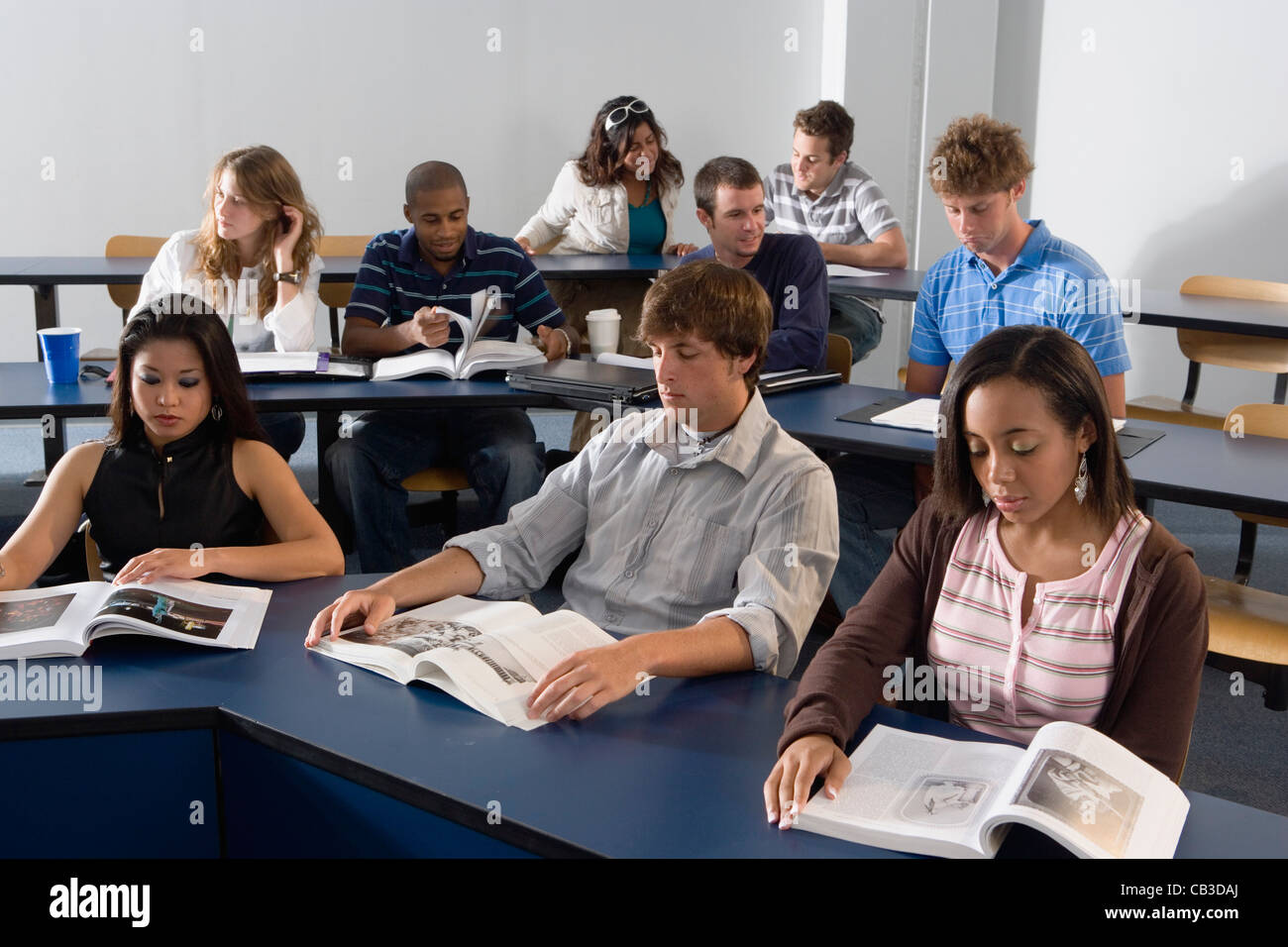 Students studying in the classroom Stock Photo - Alamy