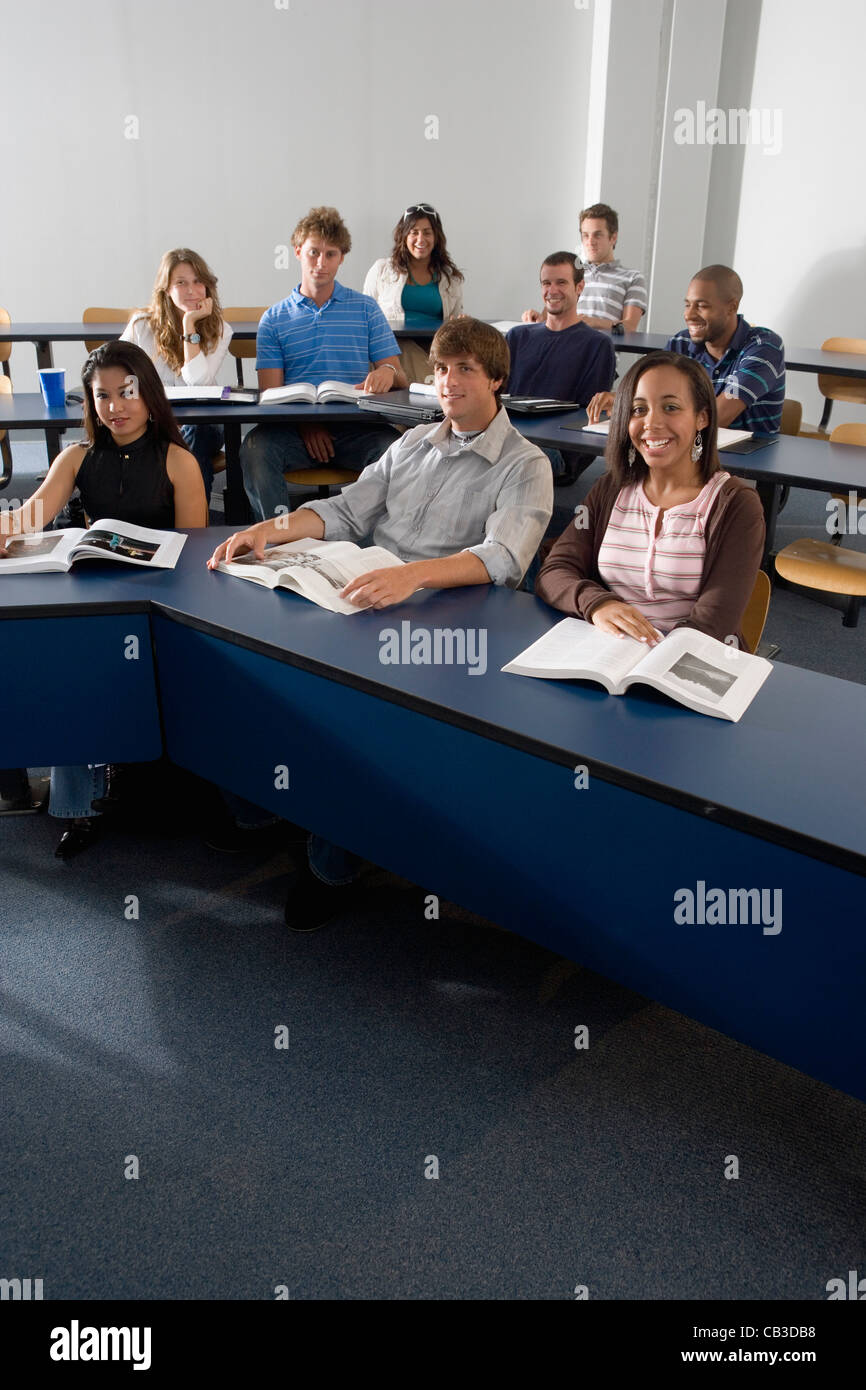 Portrait of students sitting in the classroom Stock Photo - Alamy