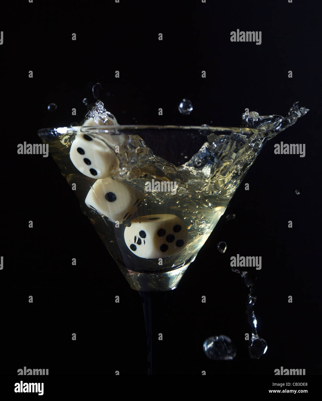Dice drink martini glass cocktail hi-res stock photography and images ...