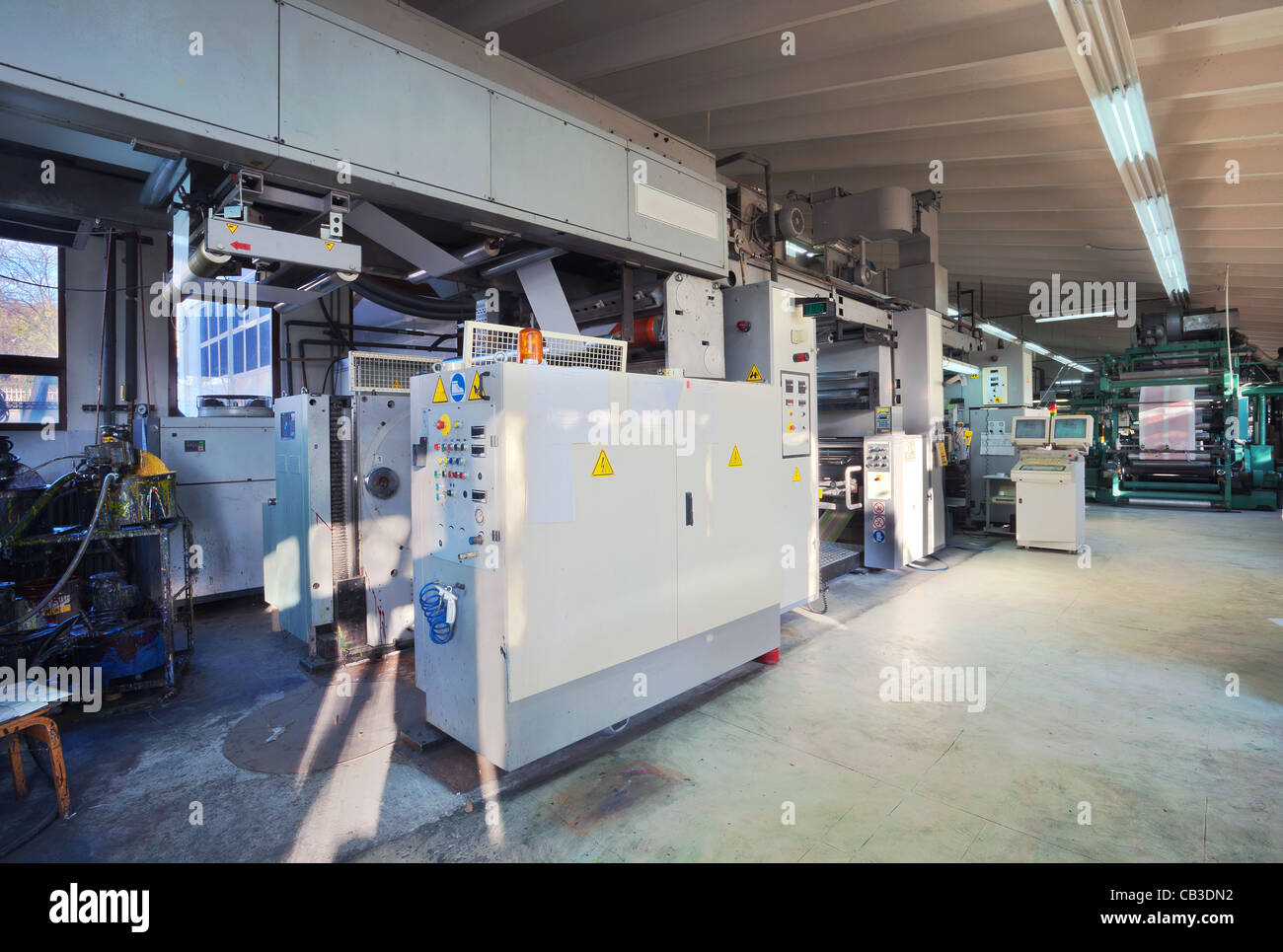 Details of a printing machine inside factory Stock Photo - Alamy
