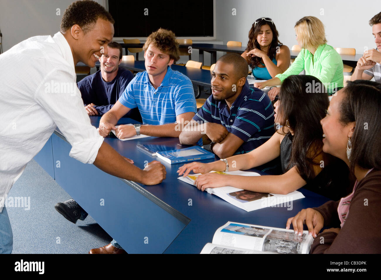 Teacher teaching students in the classroom Stock Photo - Alamy Teacher teaching students in the classroom Stock Photo - Alamy