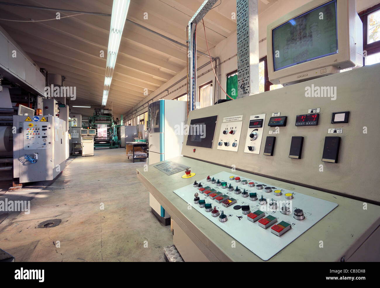 Details of a printing machine inside factory Stock Photo - Alamy