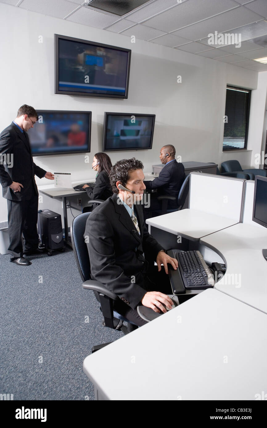 Business people working in a busy office Stock Photo - Alamy