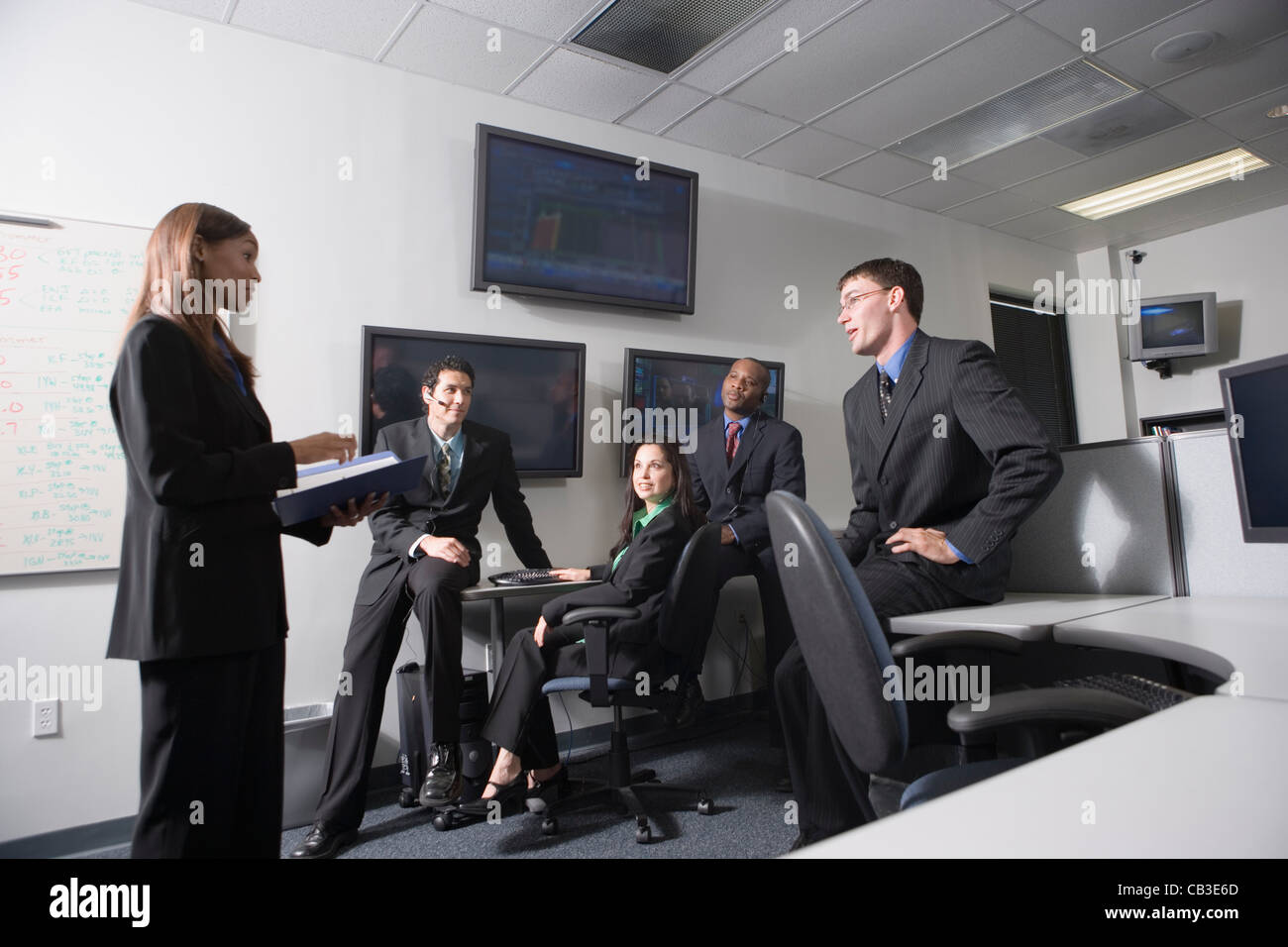 Team meeting in an office Stock Photo - Alamy