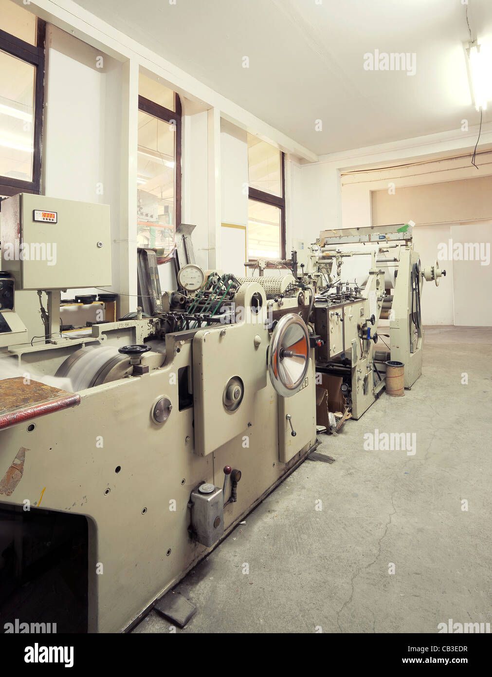 Details of a printing machine inside factory Stock Photo - Alamy