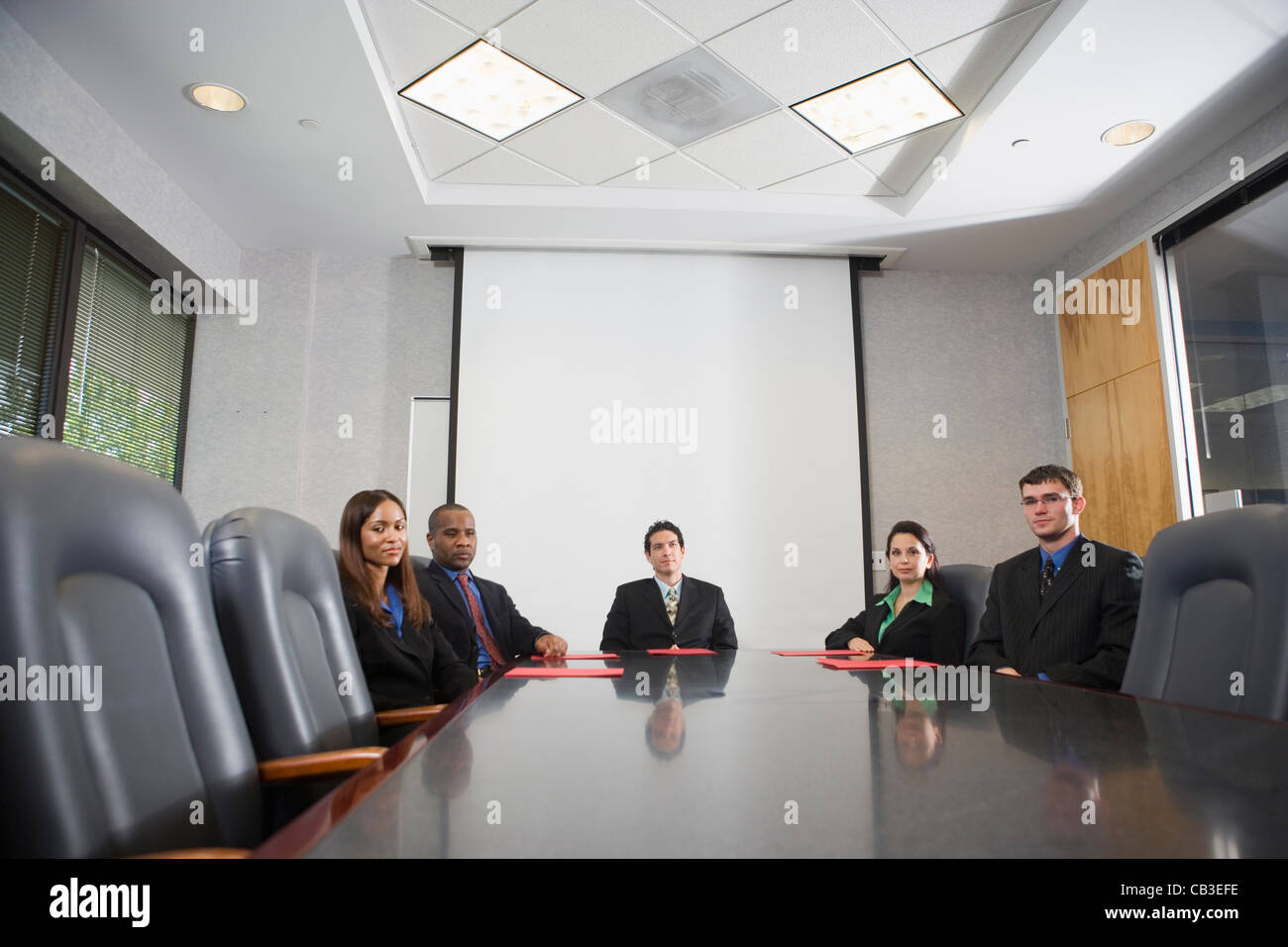 Five men in suits together hi-res stock photography and images - Alamy