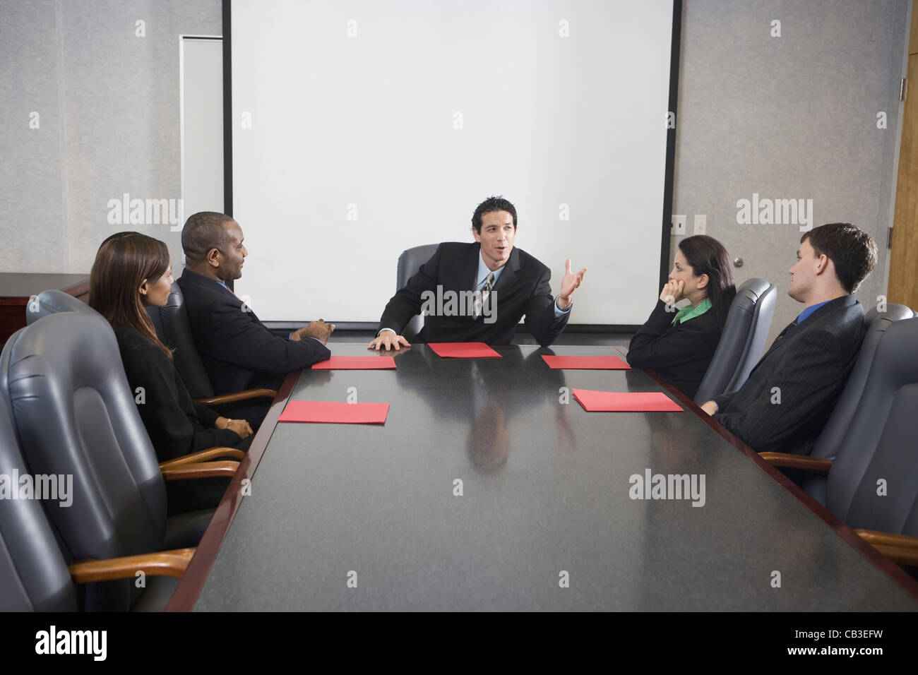 Business executives in a meeting in a formal conference room Stock ...