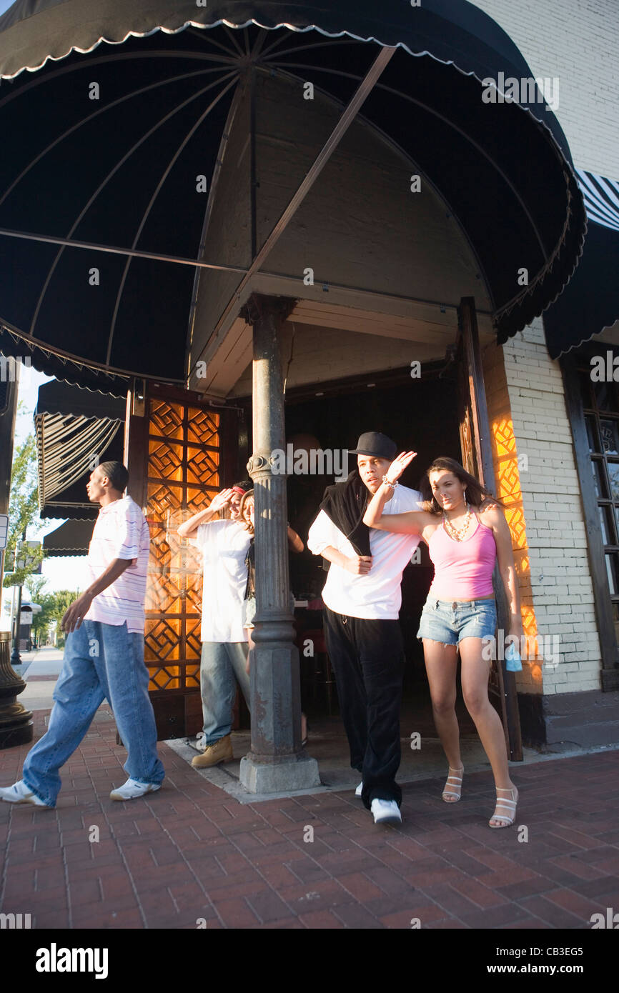 Woman leaving bar hi-res stock photography and images - Alamy