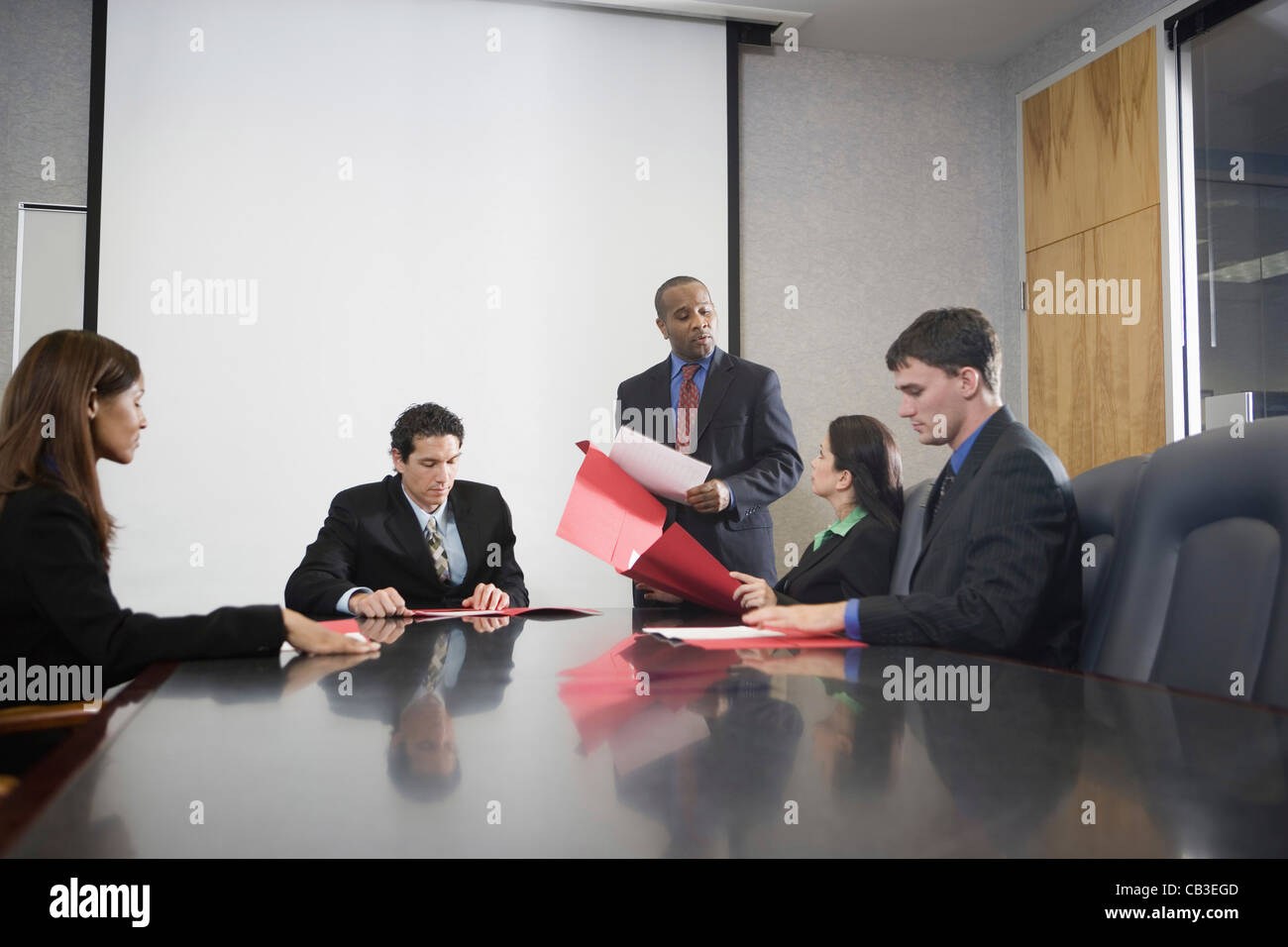 Business executives at a presentation in a formal conference room Stock ...
