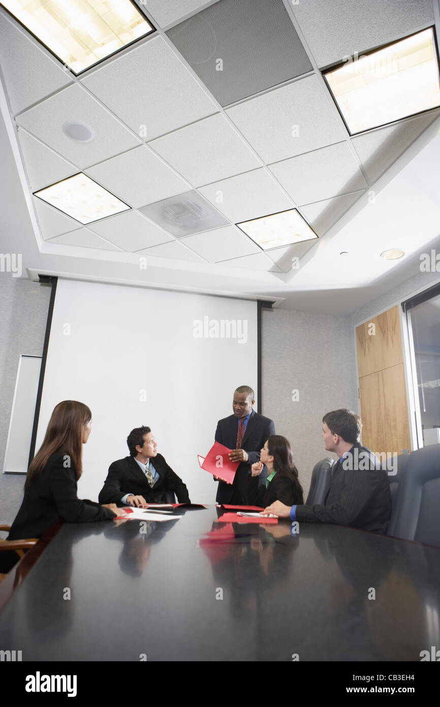 Business executives at a presentation in a formal conference room Stock ...