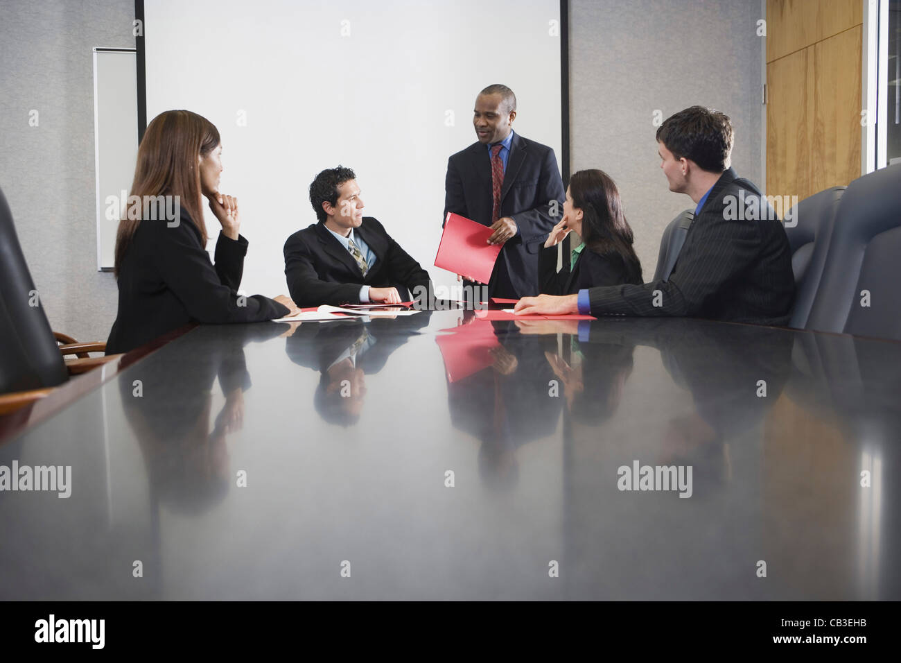Business executives at a presentation in a formal conference room Stock ...