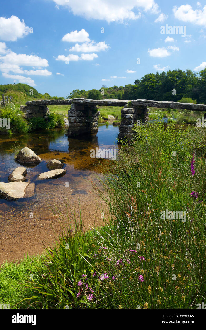 Medieval clapper bridge made of four massive granite slabs crossing the ...