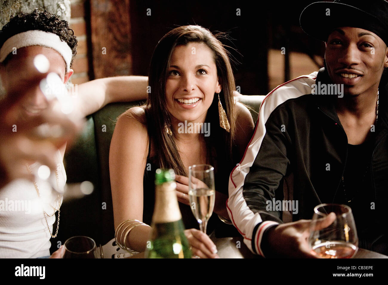 Cheerful group young friends enjoys hi-res stock photography and images ...