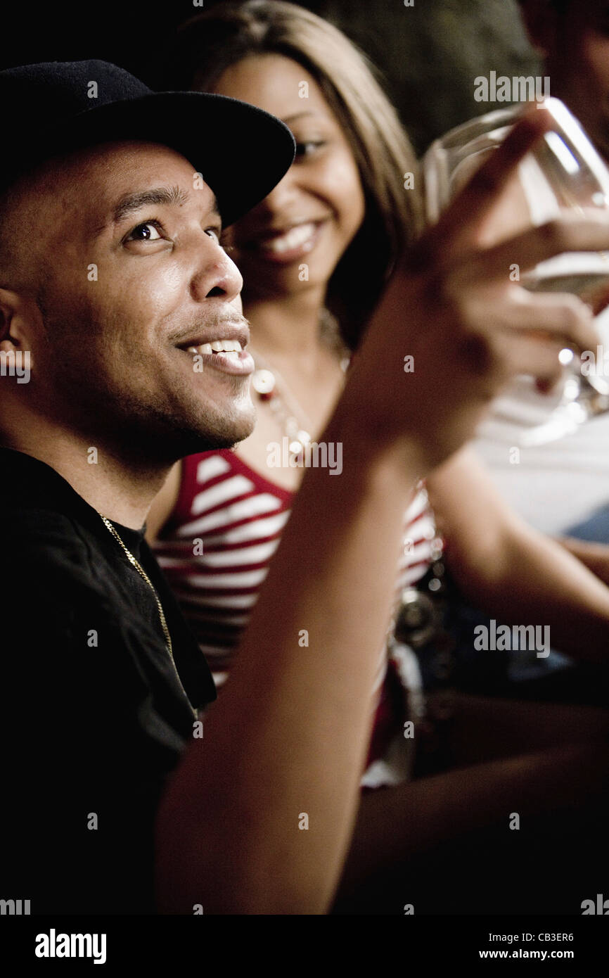 Cheerful group young friends enjoys hi-res stock photography and images ...