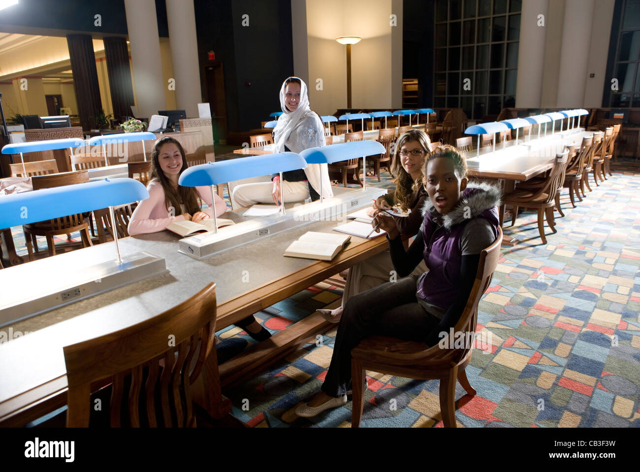 College students studying in library Stock Photo - Alamy