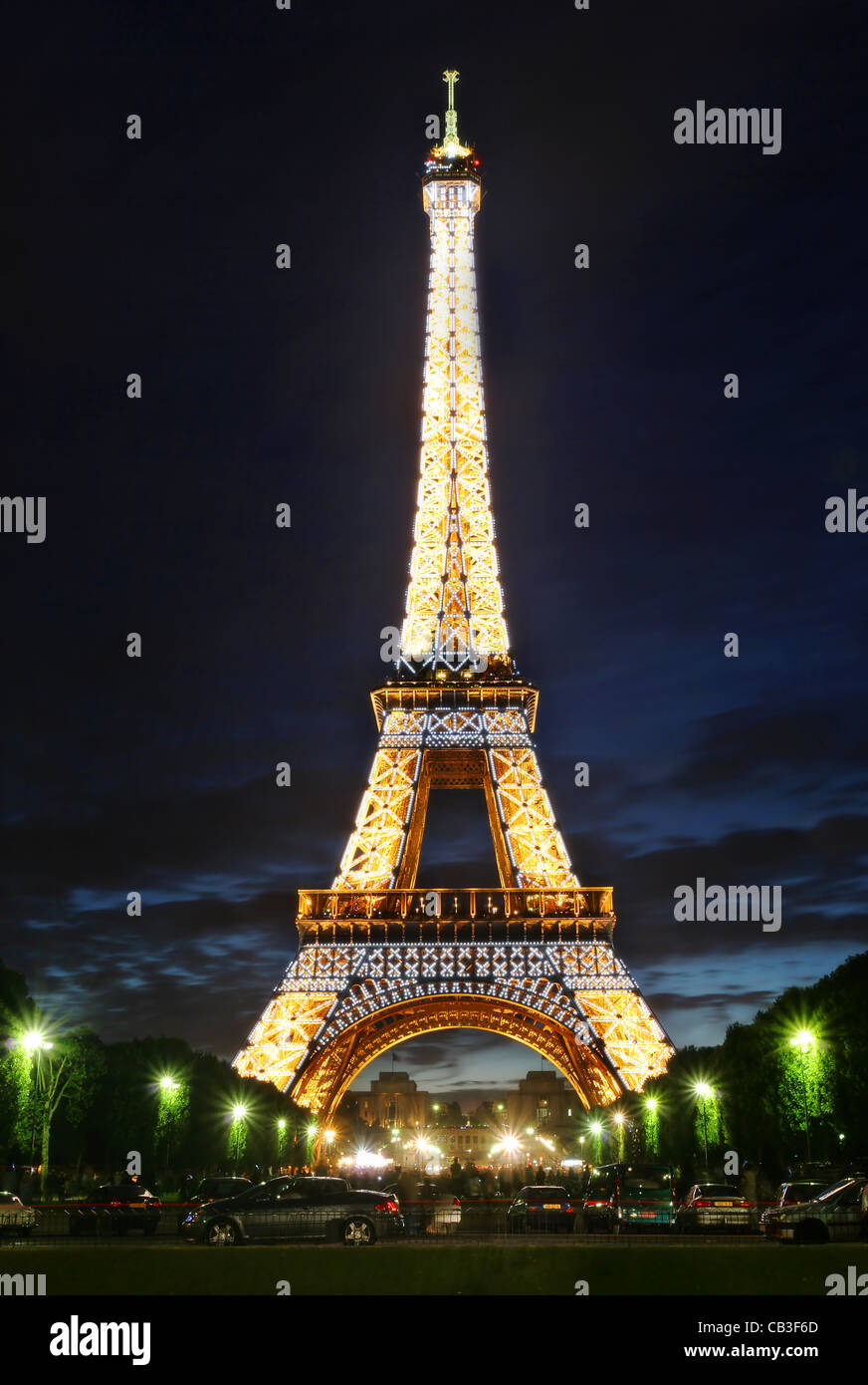 Famous Eiffel Tower at evening with night illumination in Paris, France ...