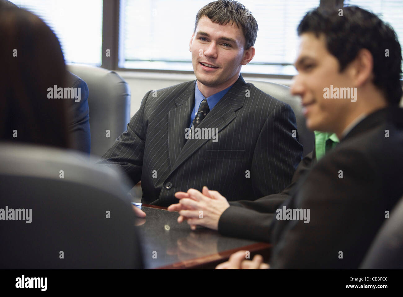 4 business executives talking hi-res stock photography and images - Alamy