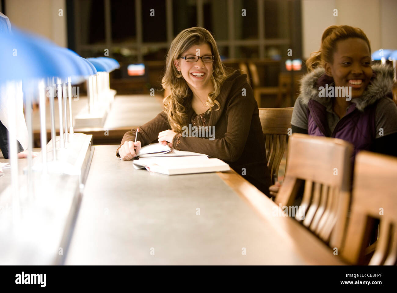 Woman women female friends interior inside tables chairs hi-res stock ...