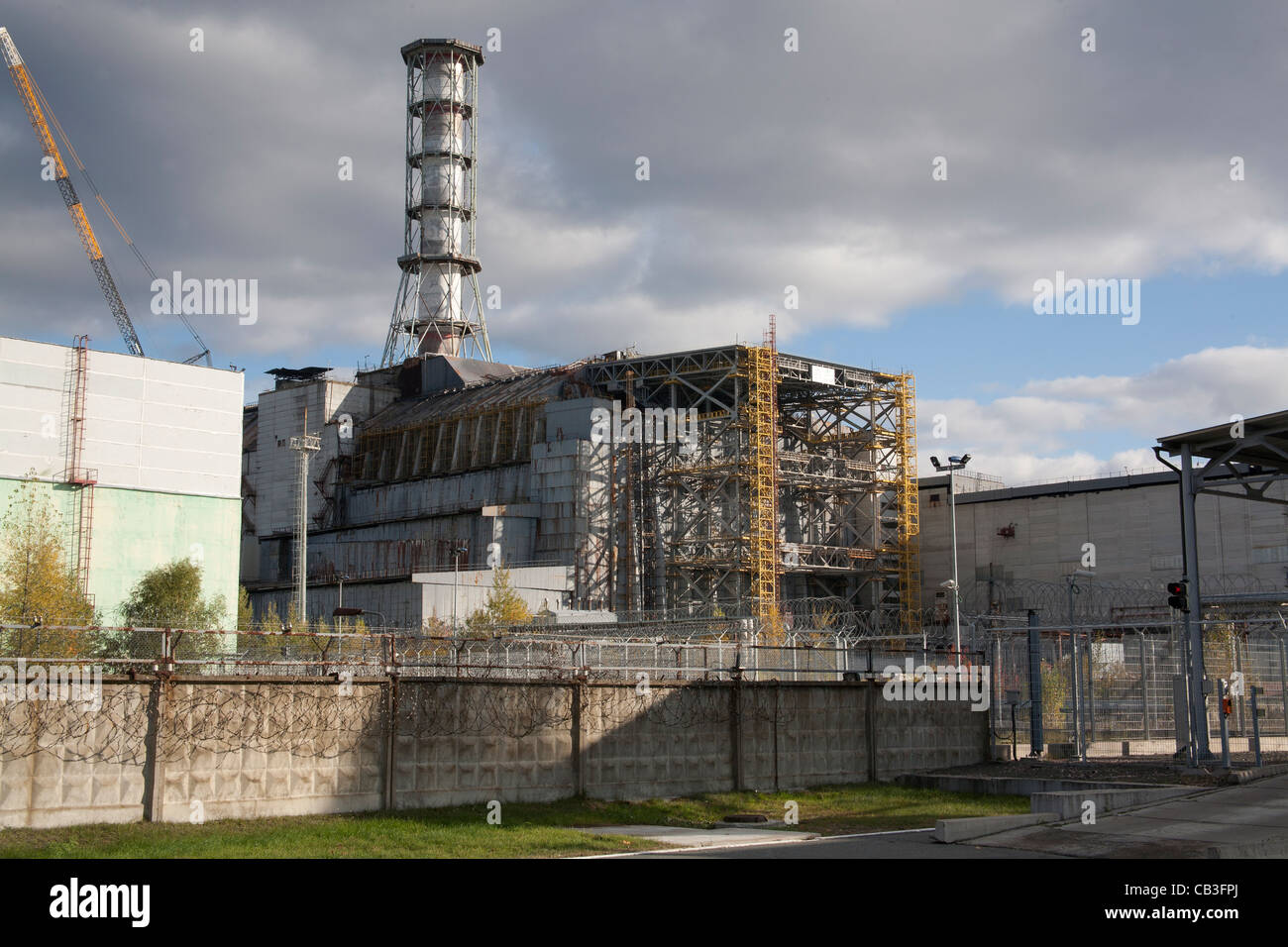 Reactor Number 4 at Chernobyl, encased in its old sarcophagus with the ...