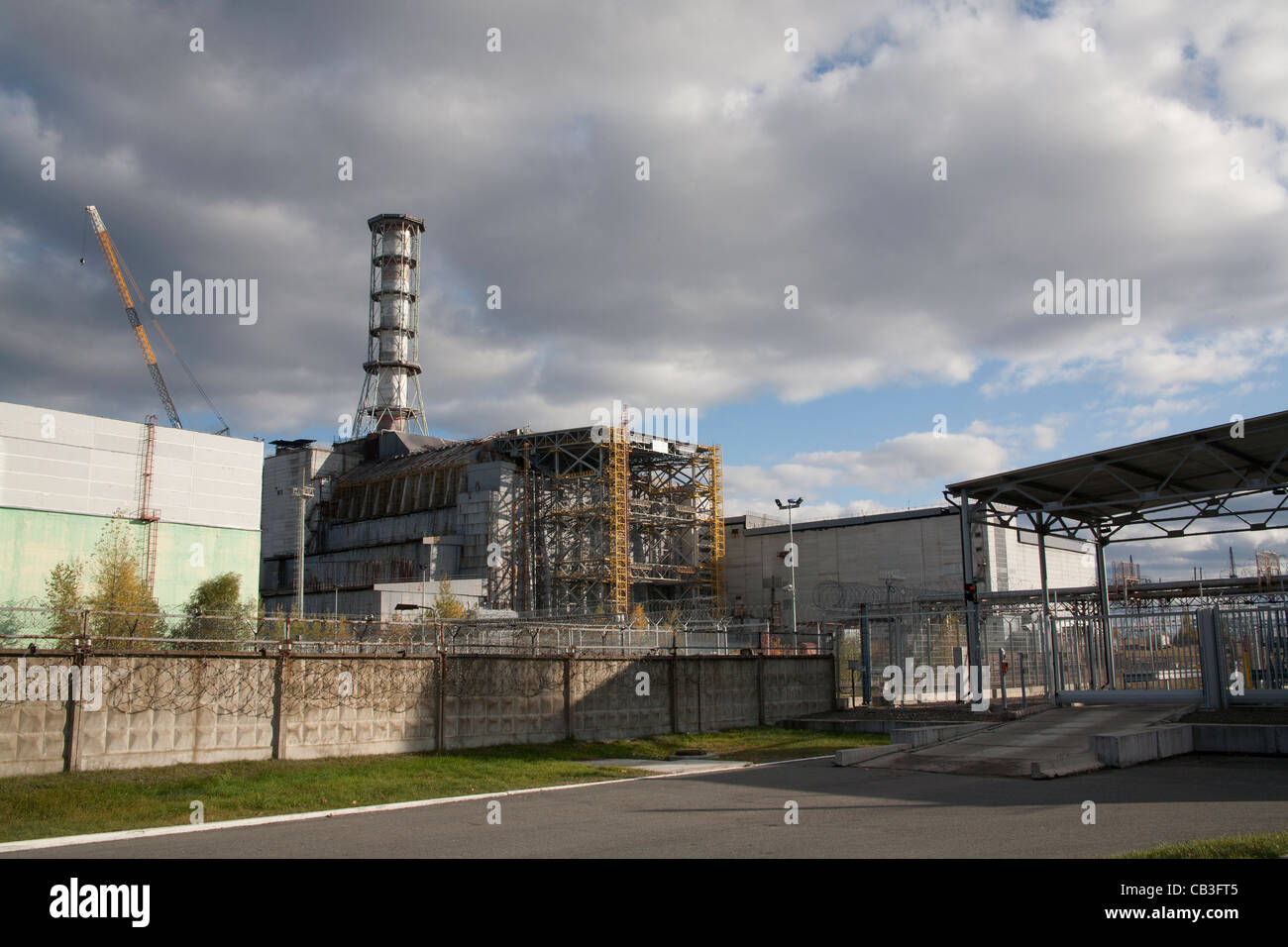 Reactor Number 4 at Chernobyl, encased in its old sarcophagus with the ...