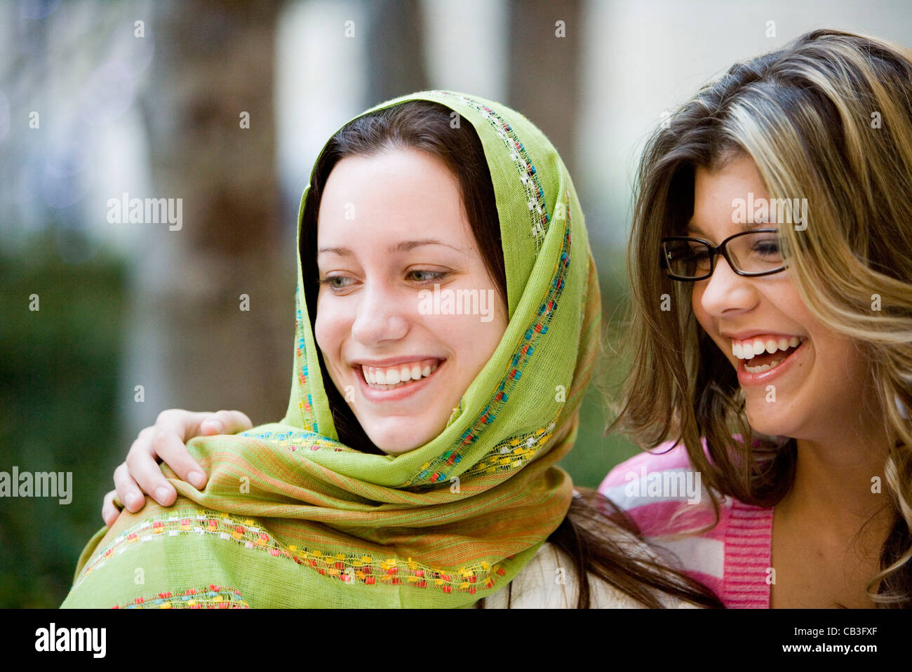 Close-up of two women friends smiling Stock Photo - Alamy