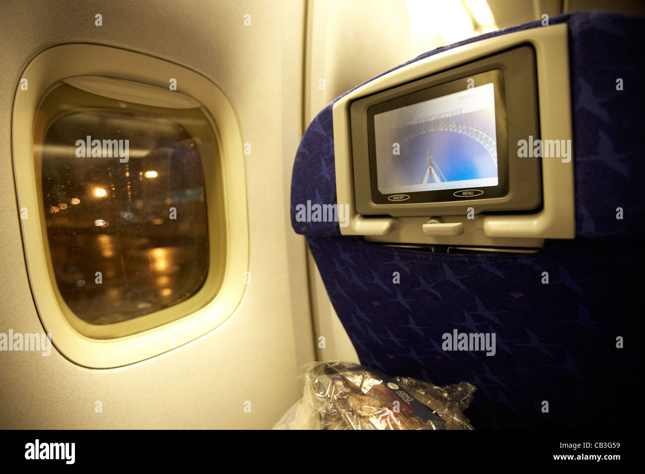 passengers individual entertainment screen on board a 747 passenger ...