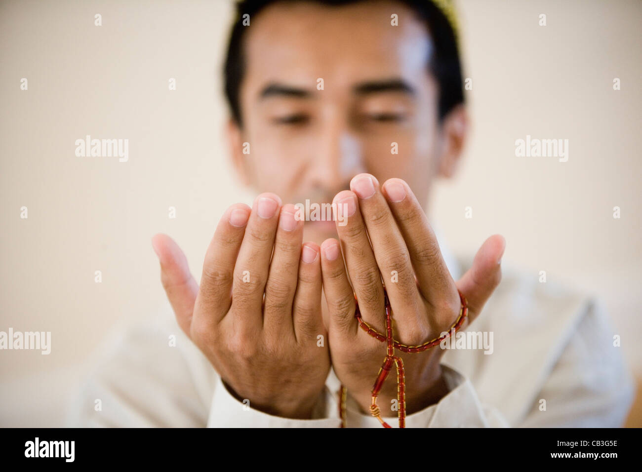 Close-up of hands praying Stock Photo - Alamy