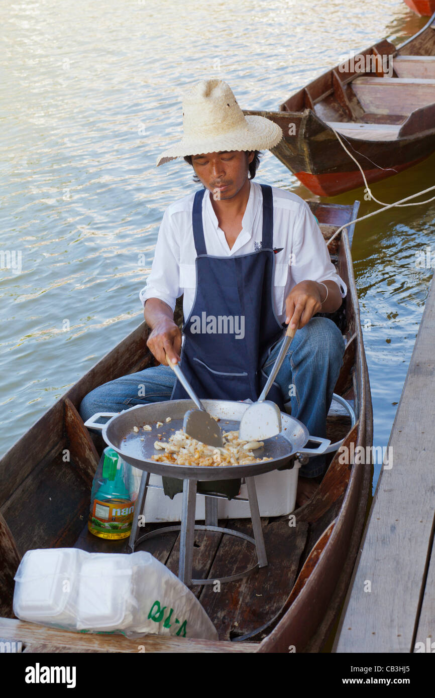 Man cooking on boat hi-res stock photography and images - Alamy