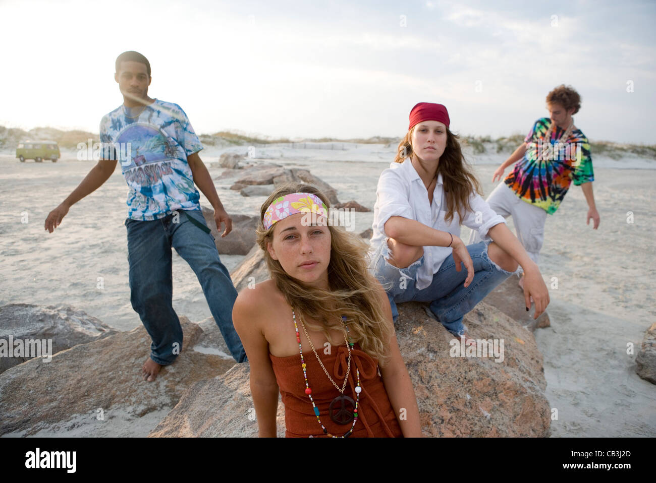 Hippies hanging out at the beach Stock Photo - Alamy