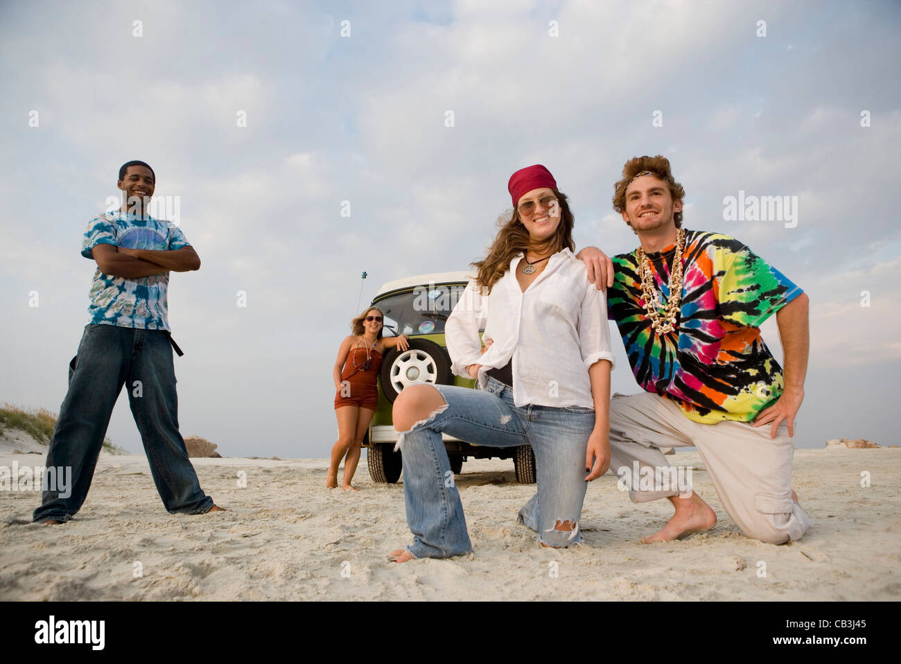 Hippies hanging out at the beach Stock Photo - Alamy