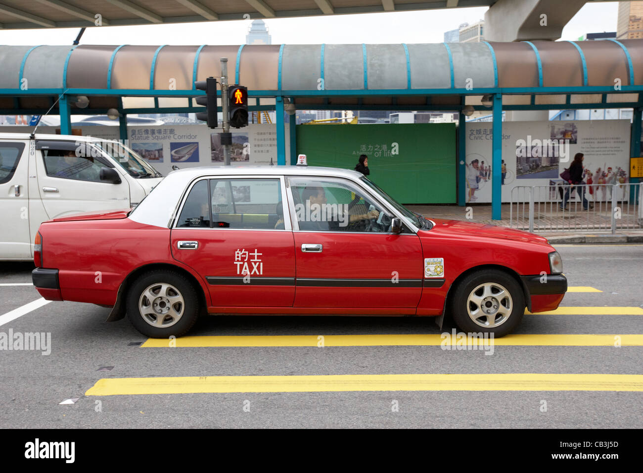 hong kong red taxi hong kong island hksar china Stock Photo - Alamy