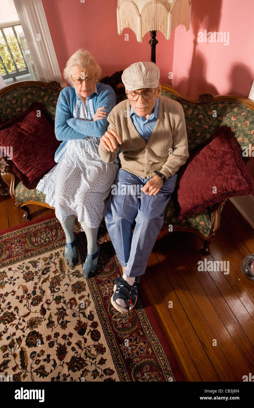 Grumpy old man sitting in hi-res stock photography and images - Alamy