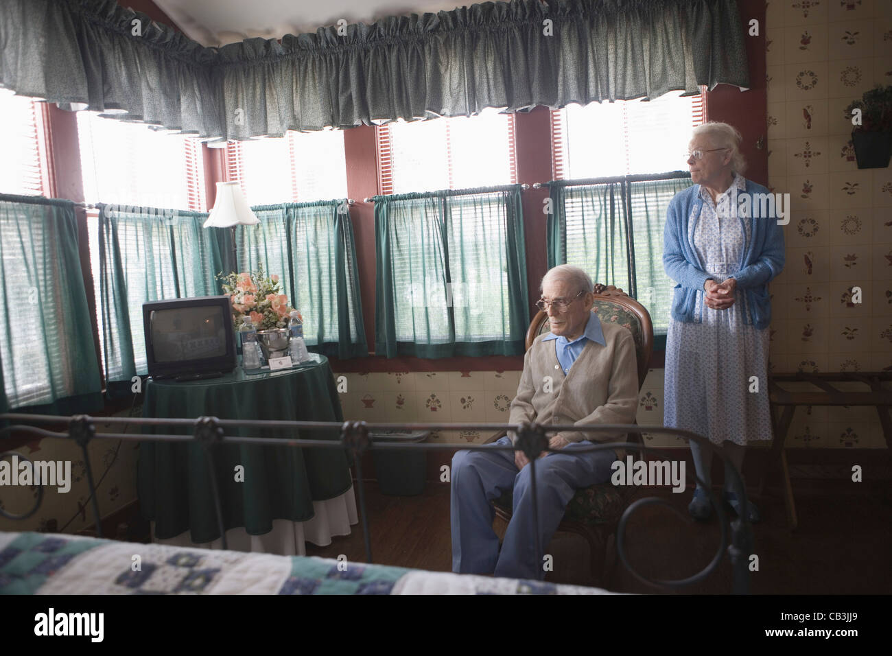 Senior couple in the bedroom Stock Photo - Alamy