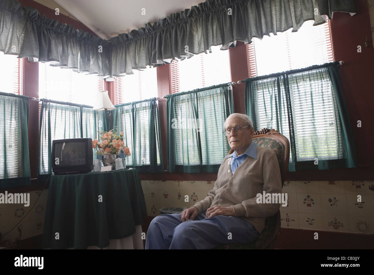 Staring senior contemplating hi-res stock photography and images - Alamy