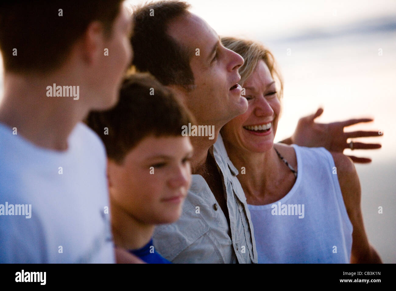 Close-up of a family standing side by side Stock Photo - Alamy