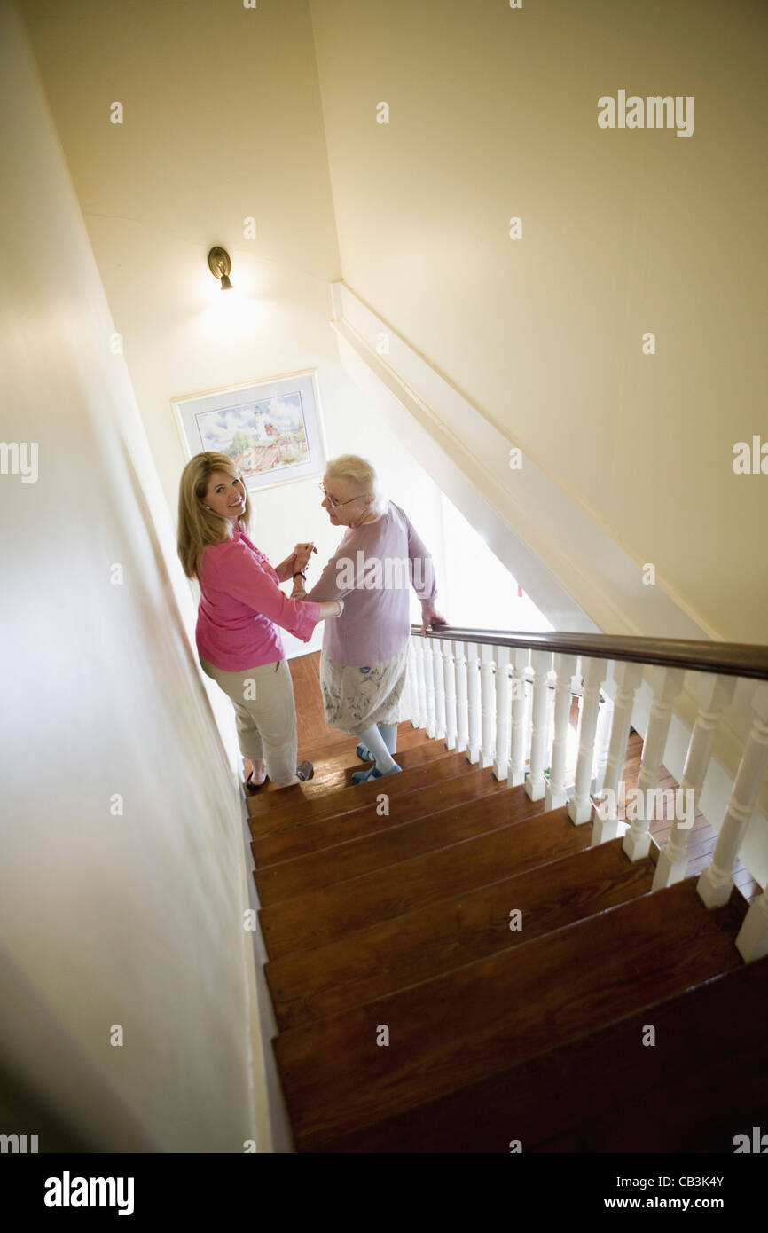 Elderly helping assist stairs hi-res stock photography and images - Alamy
