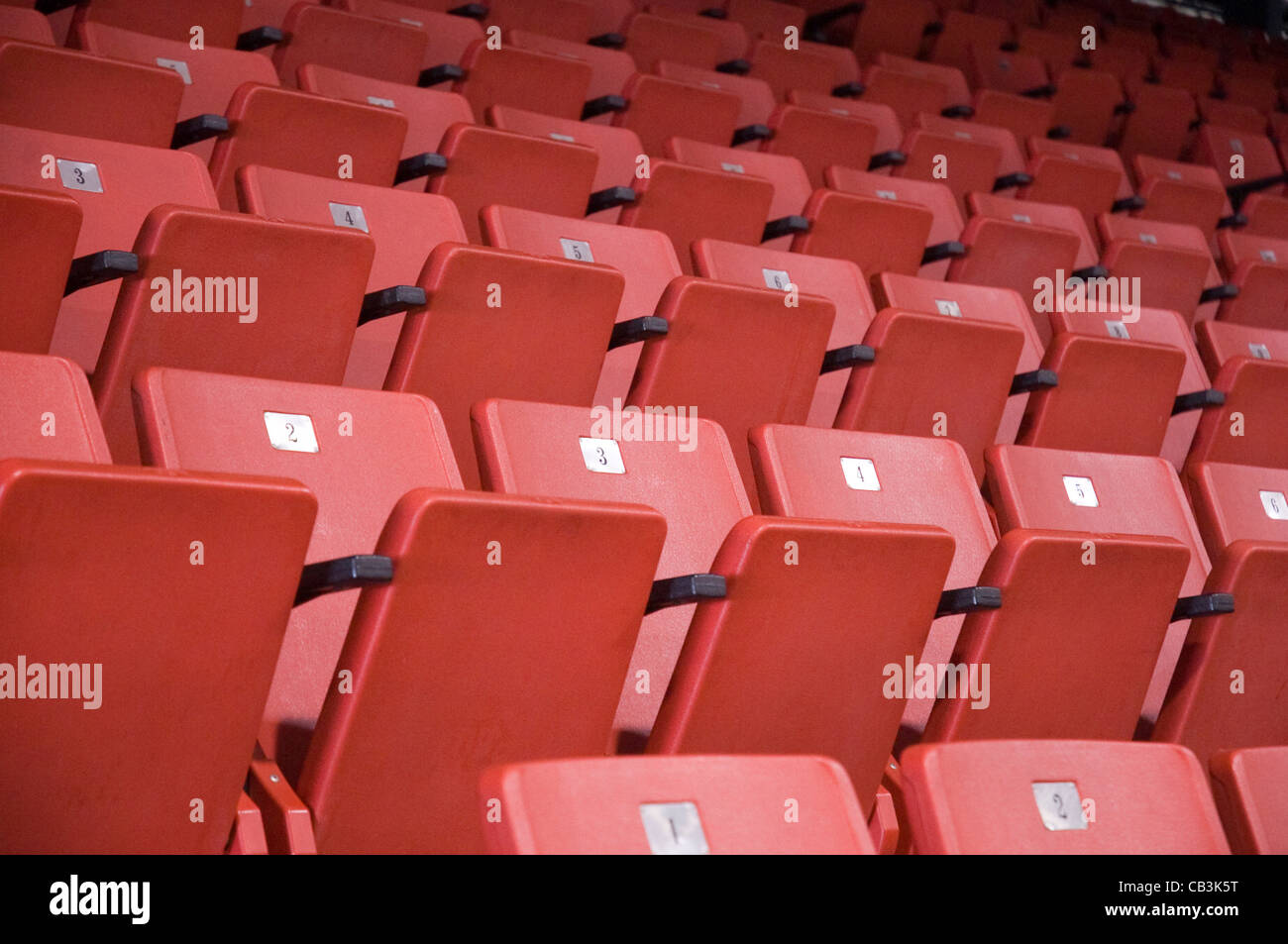 Canada, Ontario, Owen Sound, Numbered red stadium seats in indoor ...