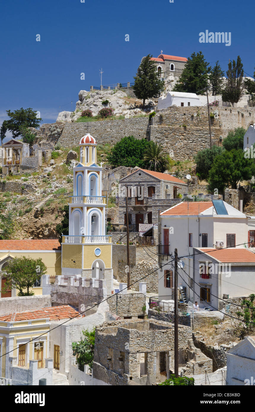 Church topped old Kastro walls above the neoclassical houses of the ...